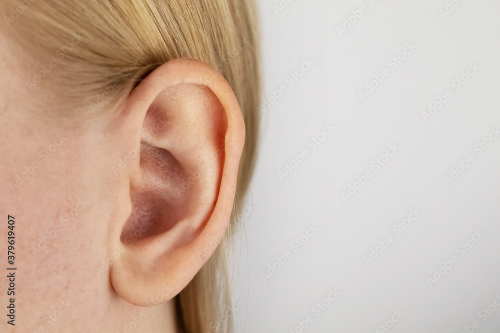 Stock-Foto „Darwin's tubercle on the ear. The girl at the reception at ...