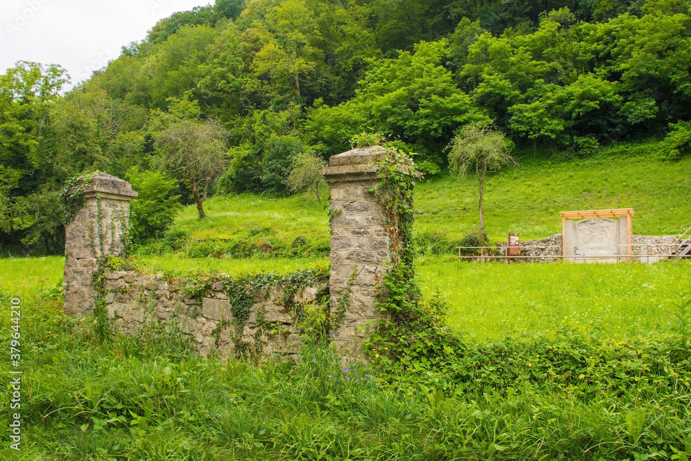 The remains of the wall at the former world war one cemetery in Kamno, Primorska, Slovenia. The ...