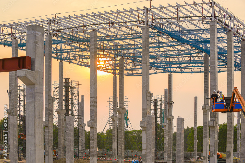 Workers using boom lift to working at height for drilling concrete ...