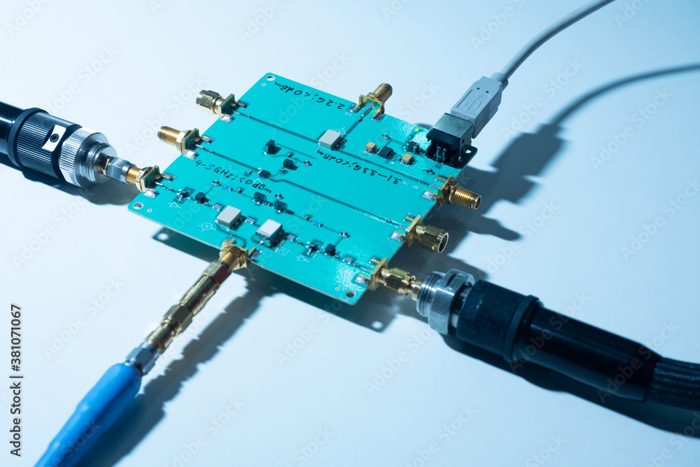 Various cables are connected to the PCB. Testing PCB board. Microboard ...