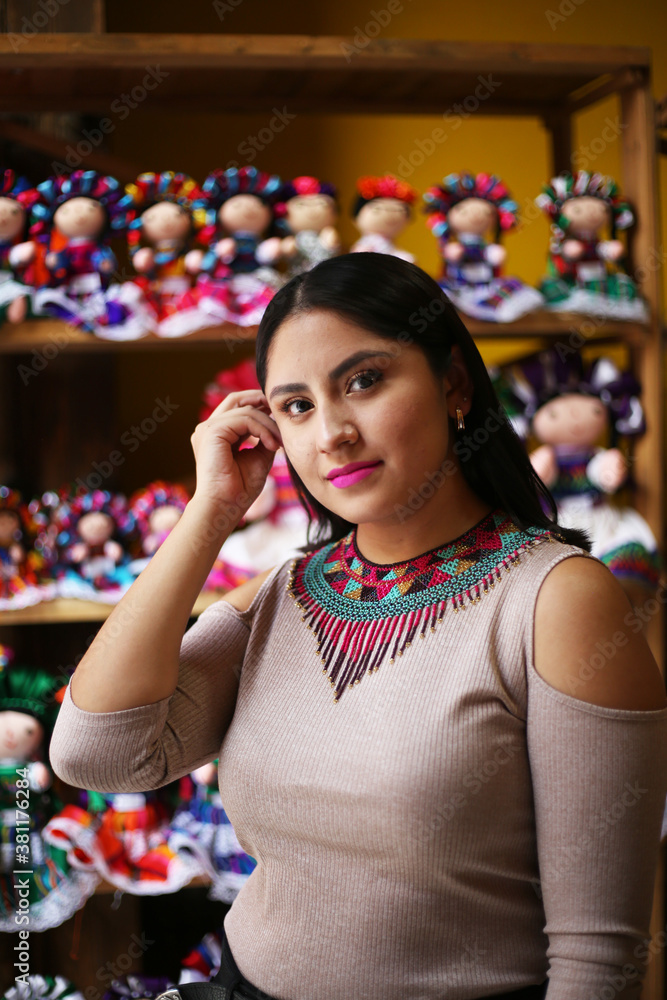 beautiful smiling mexican woman in traditional mexican dress hands up ...