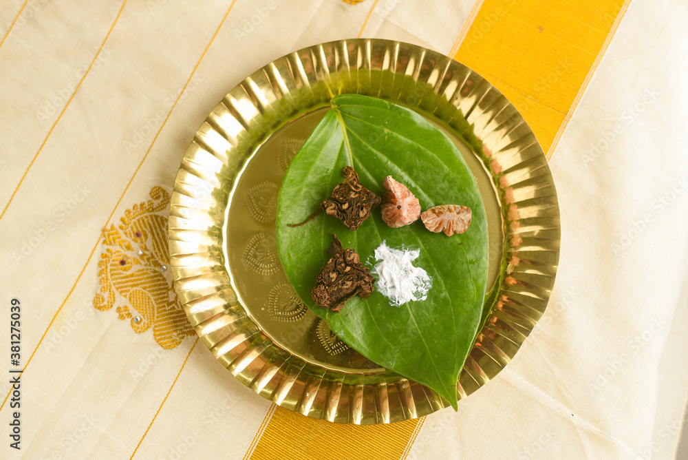 Betel leaf with areca nut paan masala, Kerala Onam festival giving ...