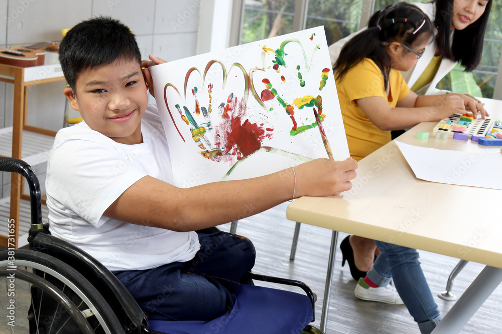 Disabled kids classroom, children having fun during study at school ...