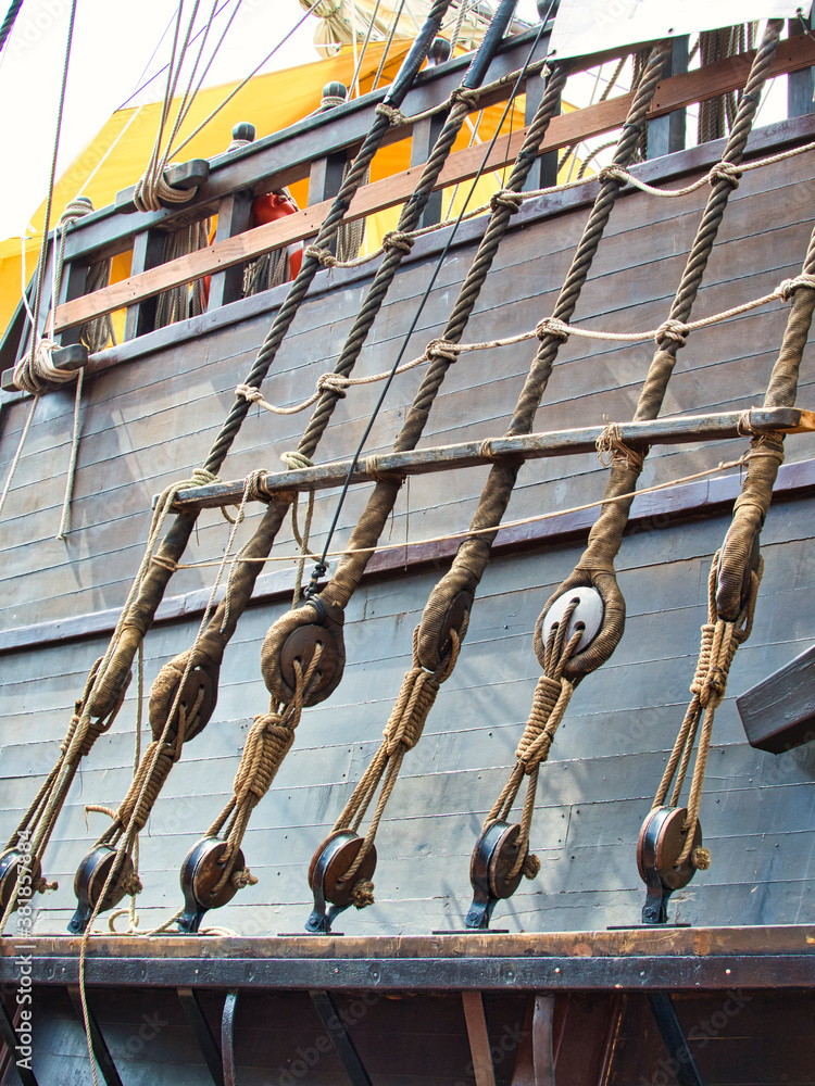 Nautical tackles and equipment of the old tall ship. Rigging ropes and ...