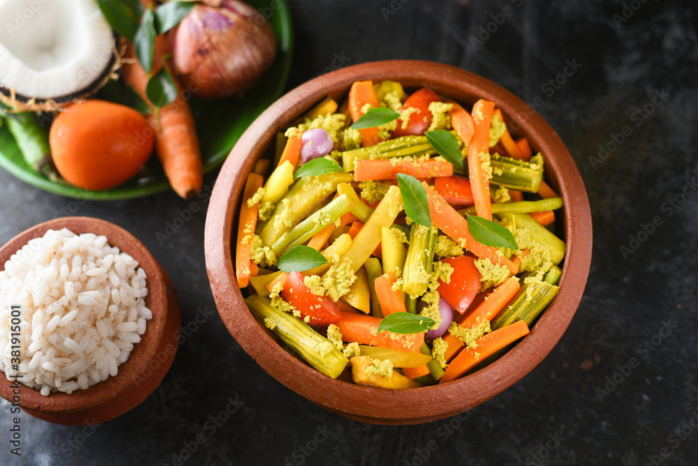 Aviyal and rice Kerala mixed vegetable curry with grated coconut on ...