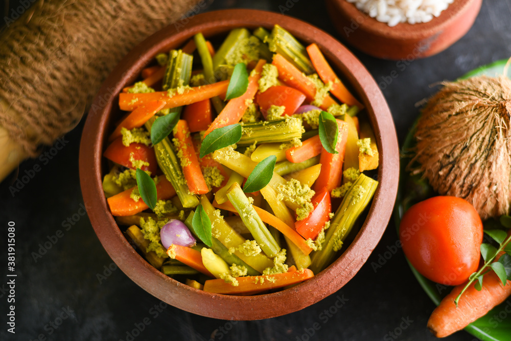 Aviyal and rice Kerala mixed vegetable curry with grated coconut on ...