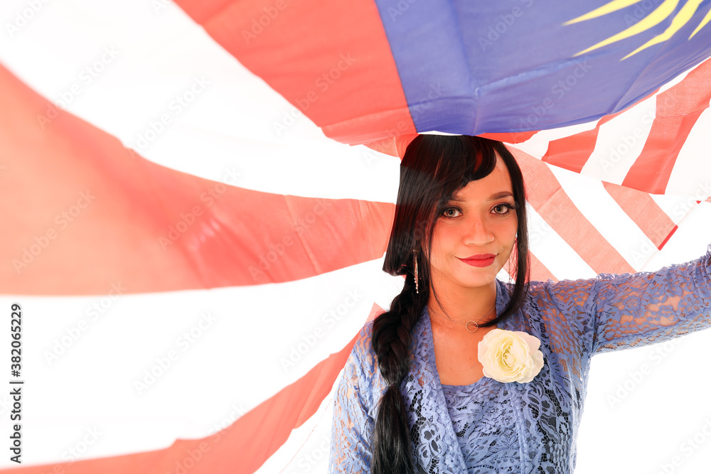 South east Asian Malay race ethnic origin woman wearing blue kebaya ...