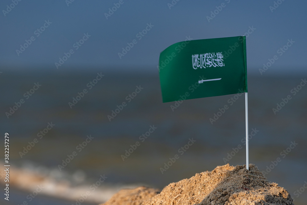 Flag of Saudi Arabia on sea background. Vacation in Saudi Arabia ...