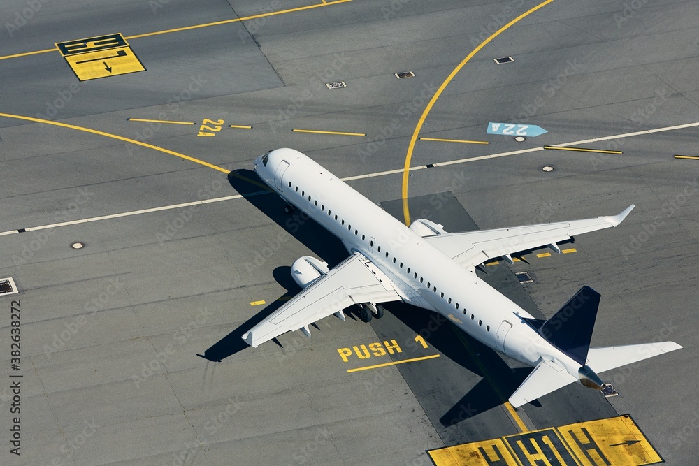 Aerial view of airplane at airport Stock Photo | Adobe Stock