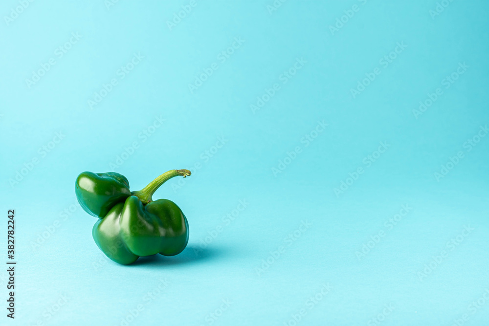 Foto de Stock Trendy weird ugly sweet pepper with mutations on a light ...