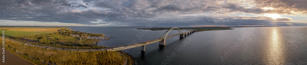 Panorama aerial view of Fehmarn Sound Bridge in sunset ...