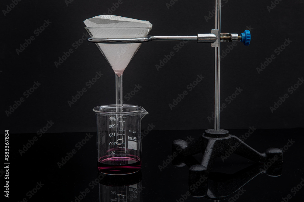 Filter paper in laboratory. Scientists are chemical filtration by ...
