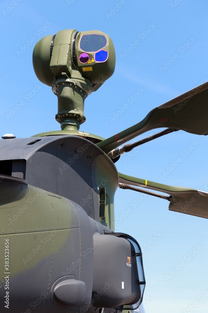 Mast-mounted sight with infrared and CCD TV cameras on a military ...