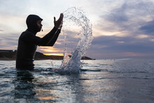 Man Splashing Water Drops In Sea Free Stock Photo - Public Domain Pictures