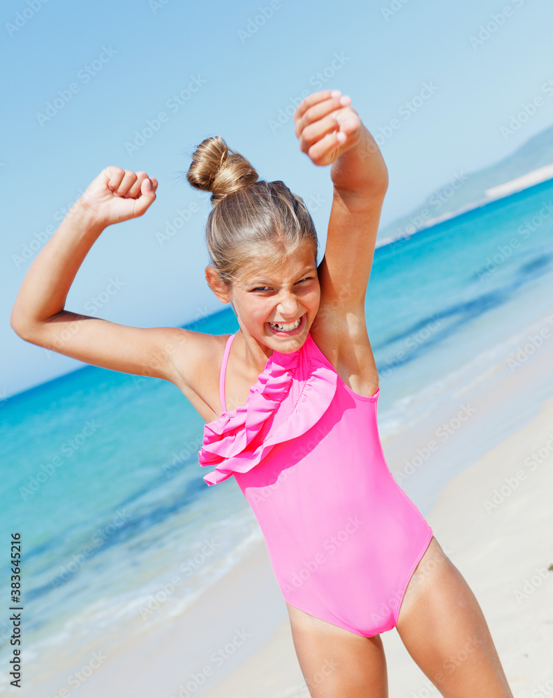 Cute girl on the beach Stock Photo | Adobe Stock