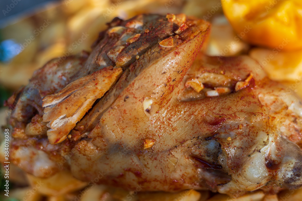 Pork knuckle baked in a tandoor. The shank is the part of a pork leg ...