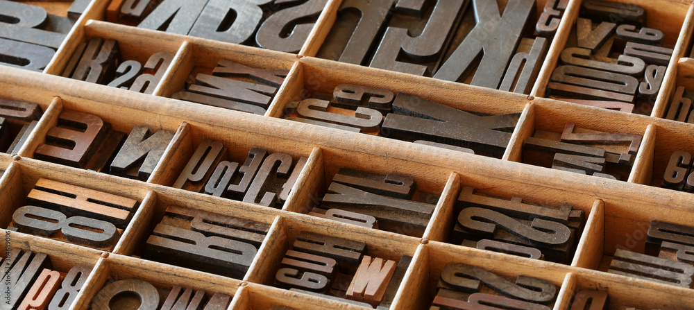 Old letterpess background. Collection of vintage block letters made of ...