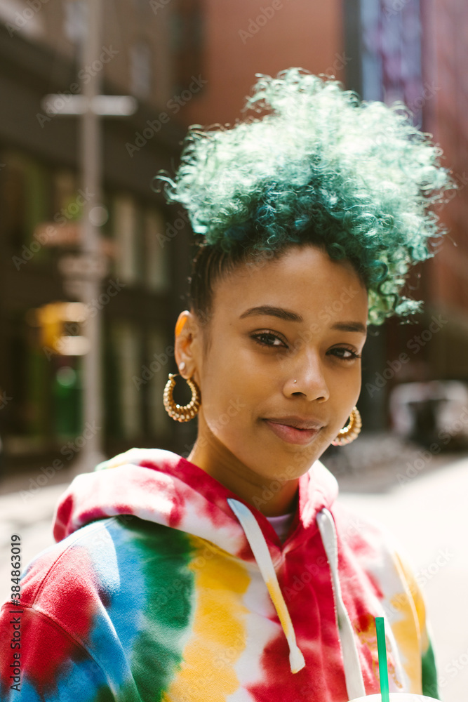 Cool woman in city street Stock Photo | Adobe Stock