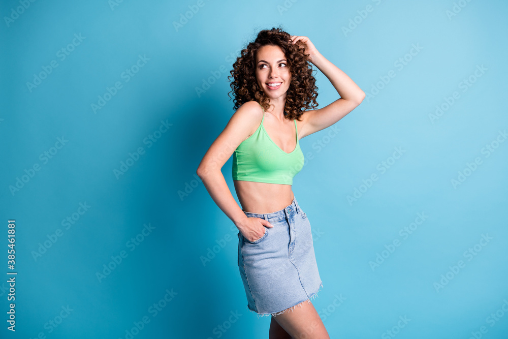 Photo nice pretty cheery shiny lady look empty space hand touch head ...