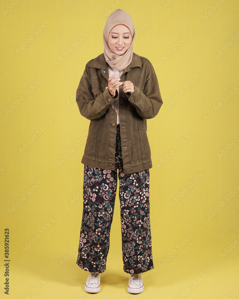Female fashion models pose like famous models. The woman is wearing ...