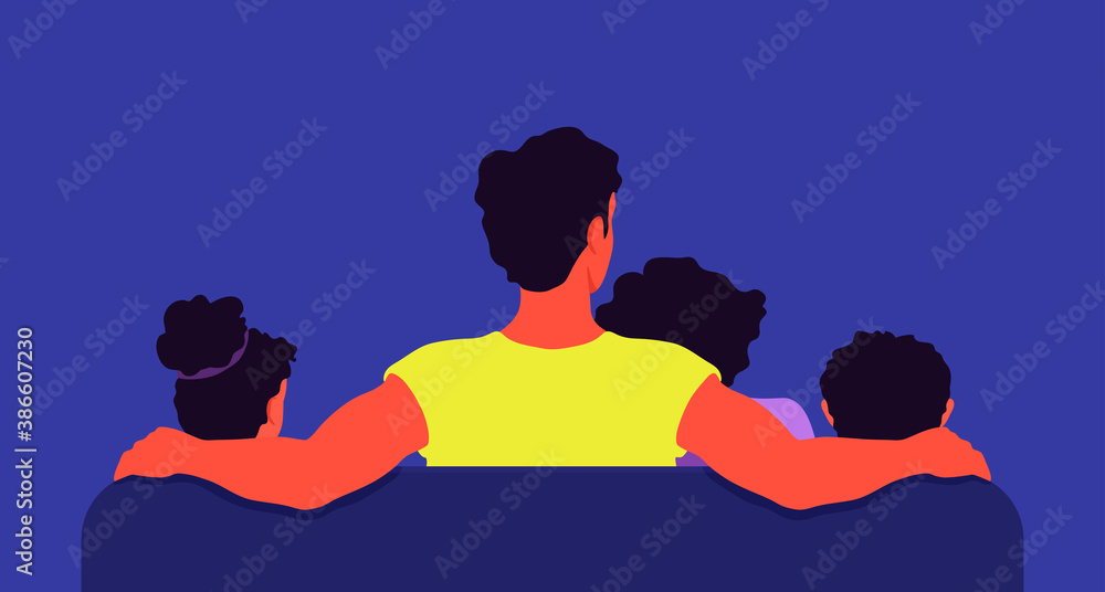 Family sitting on a sofa, watching TV. View from the back. Parents and ...
