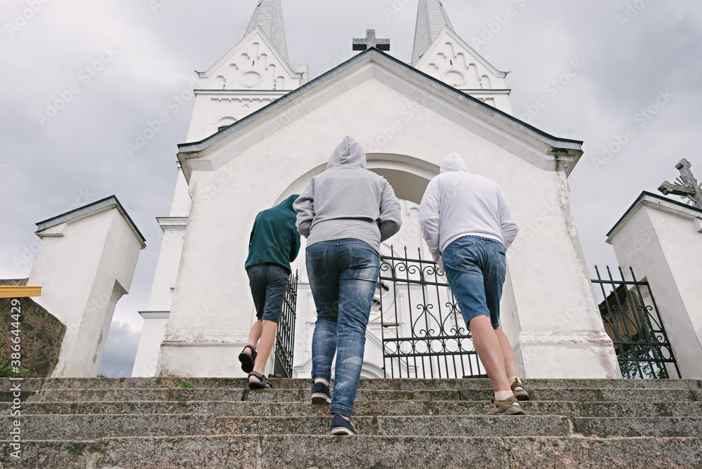 Tourists visit an old Catholic church in the village of Slobodka ...