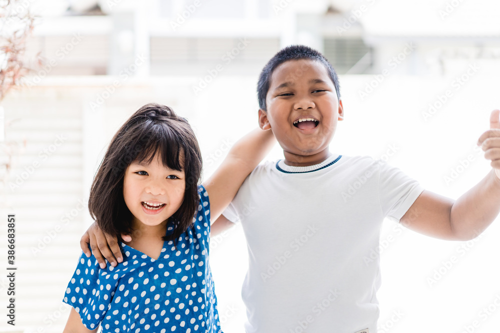 Equality and Racism.Asian kid girl and african american boy in school ...