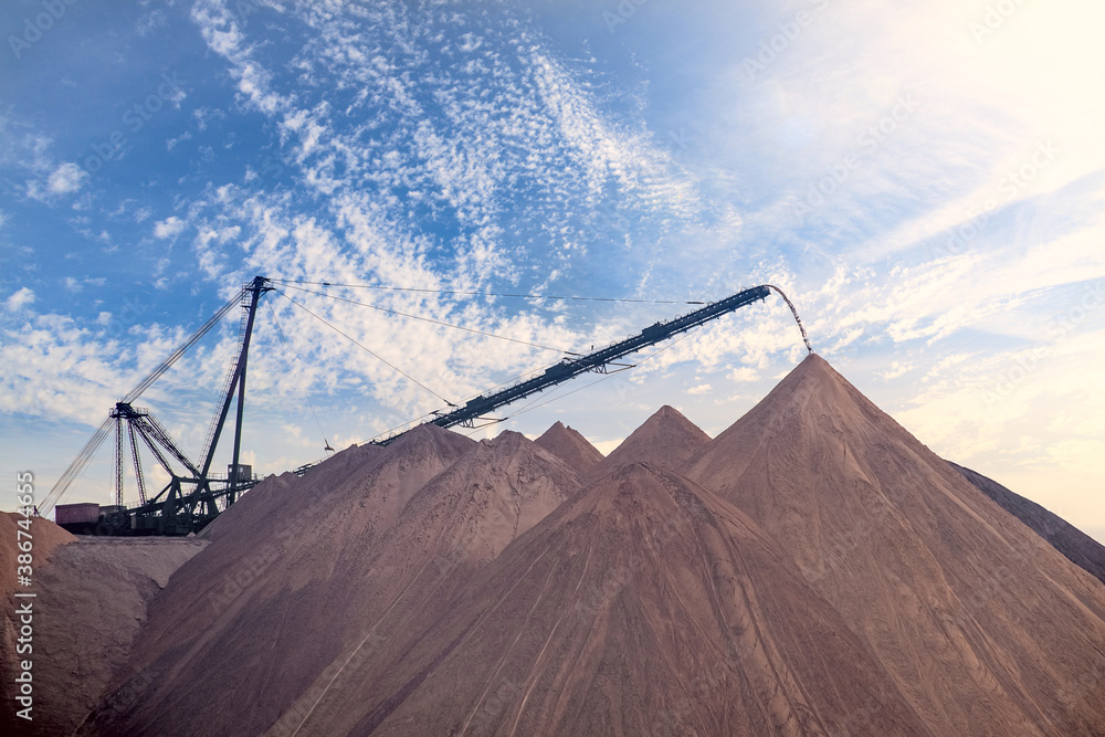 Extracting and mining potassium salts. Large excavator machine and Huge ...