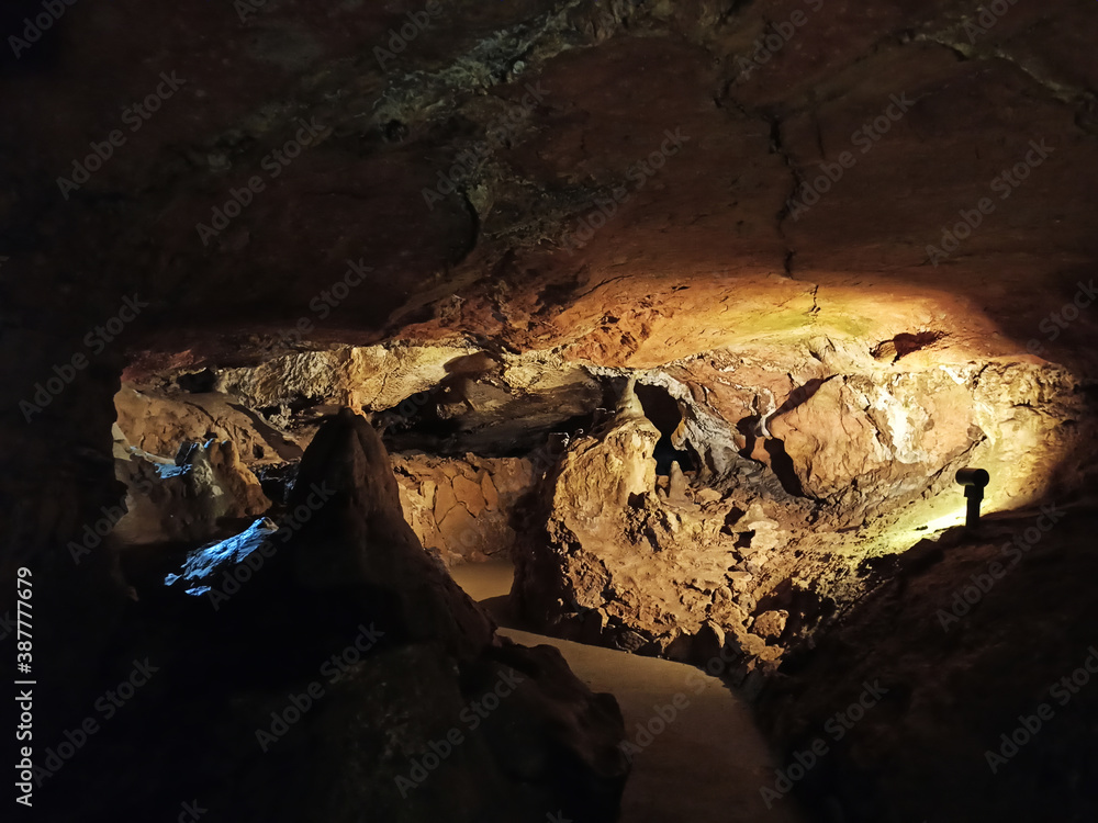 Journey. View inside a deep cave to the south. stalactites and ...