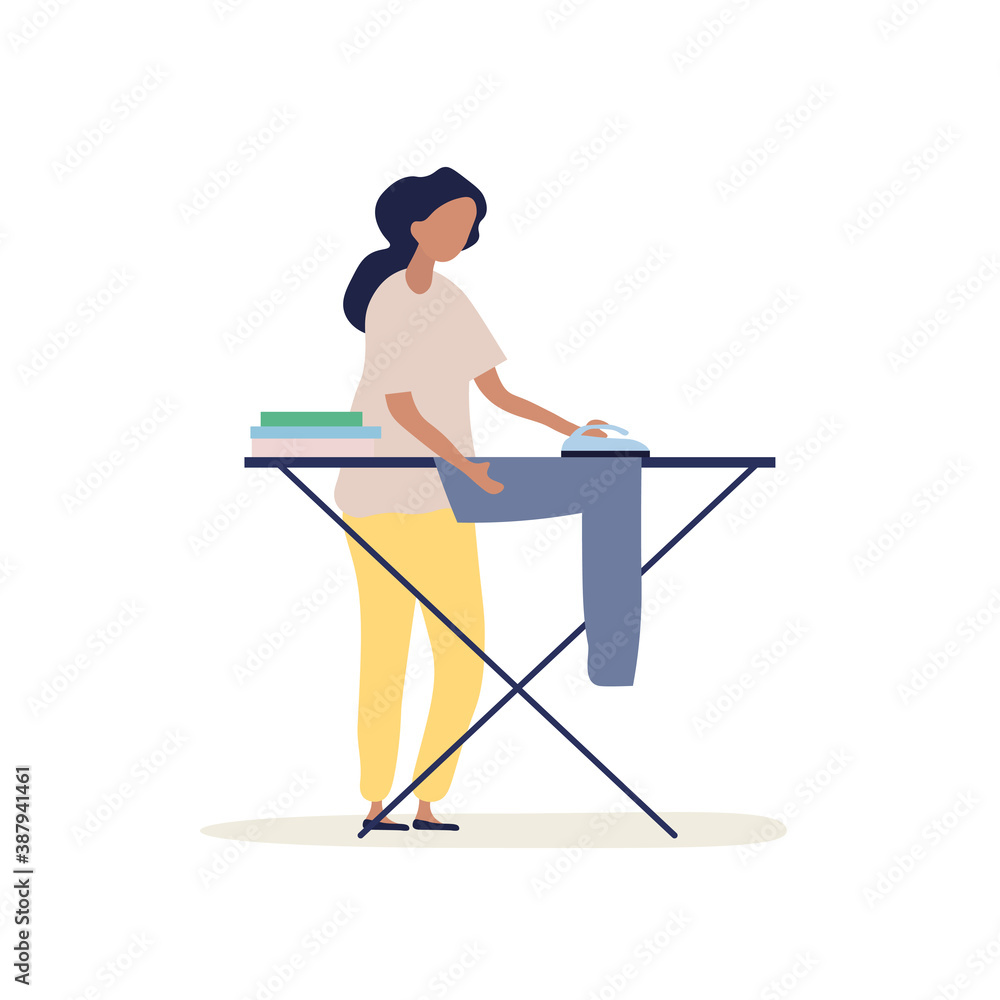 Housekeeping concept. Young woman ironing clothes on an ironing board ...