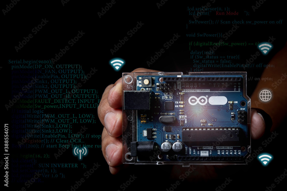 Arduino controller board element photo in dark background with ...