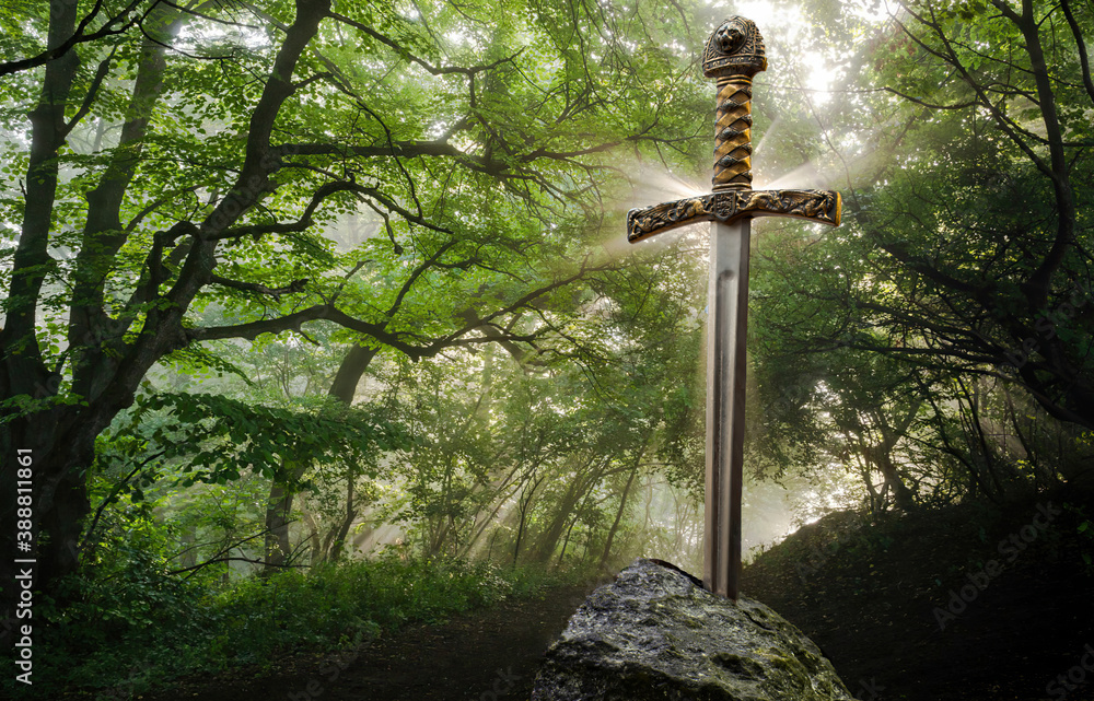 Excalibur, the mythical sword in the stone of King Arthur. Stock Photo ...