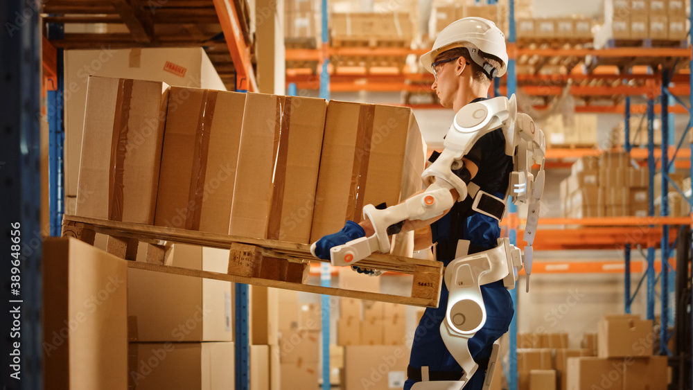 High-Tech Futuristic Warehouse: Worker Wearing Advanced Full Body ... High-Tech Futuristic Warehouse: Worker Wearing Advanced Full Body ...