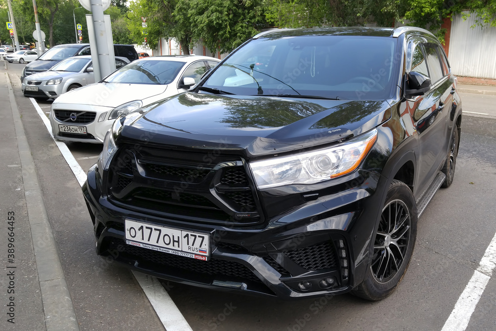 Moscow. Autumn 2018. Black Toyota Highlander in Khann tuning, wide body ...