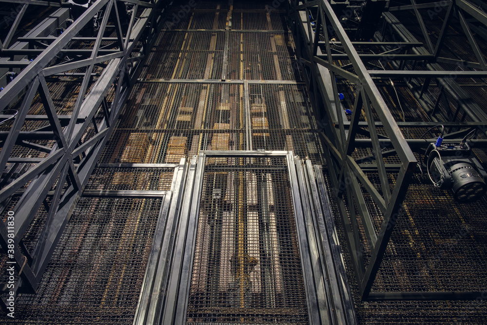 Technical equipment at the backstage of theater. Devices, wires and ...