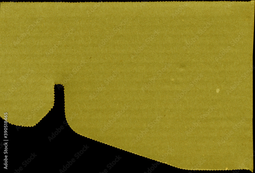 Close up of a yellow vintage torn sheet of carton. Cardboard paper ...