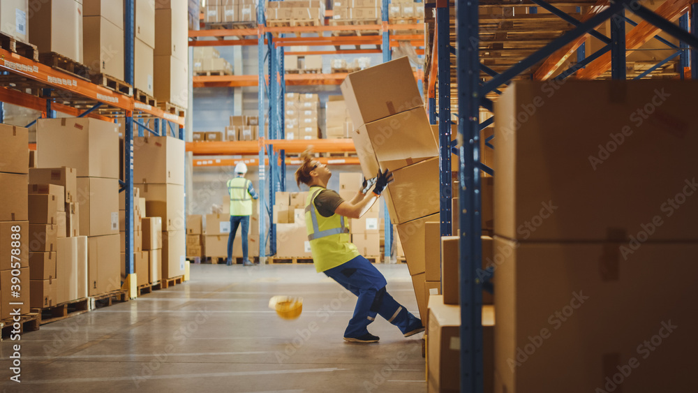 Shot of a Warehouse Worker Has Work Related Accident. He is Falling ...