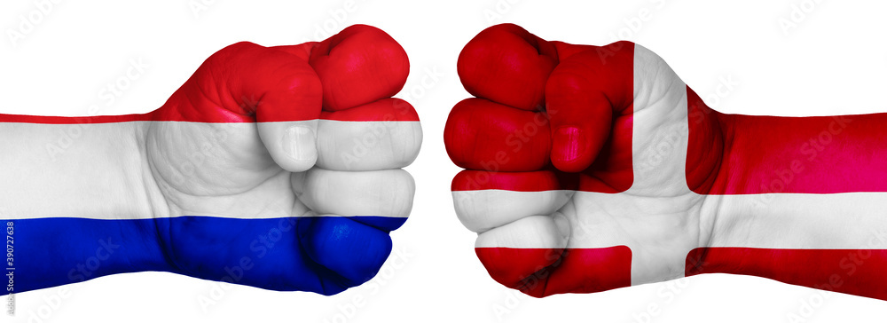 Two hands are clenched into fists and are located opposite each other ...