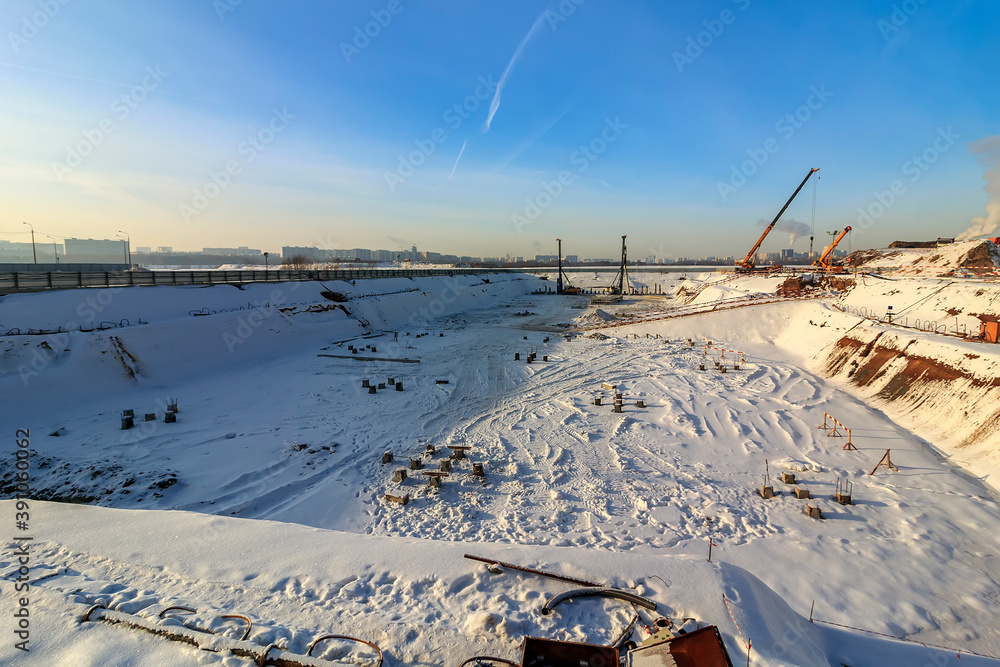 Pile driving in foundation pit. construction of apartment building ...