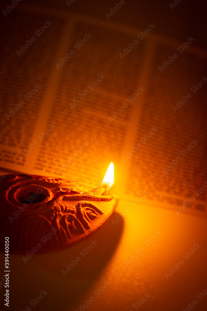 Ancient Lamp Illuminating the Hebrew Text of the Torah Stock Photo ...