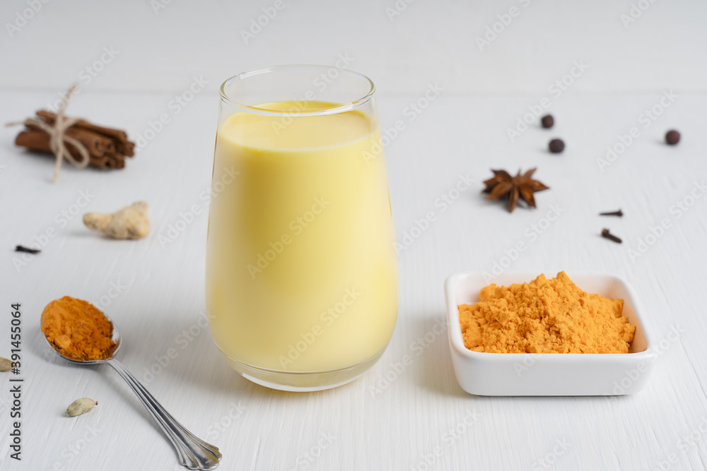 Ayurvedic Indian golden turmeric milk or haldi doodh which is source of ...