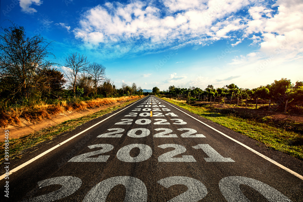2020-2030 written on highway road in the middle of empty asphalt road ...