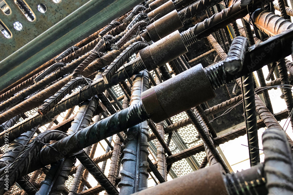 Metal threaded couplings connecting reinforcing rebars. Reinforcement ...