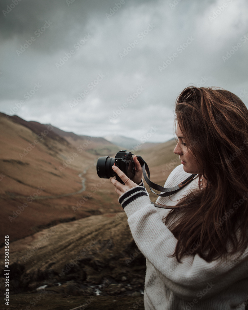 Photographing in the Lake District, side profile model overlooking a ...