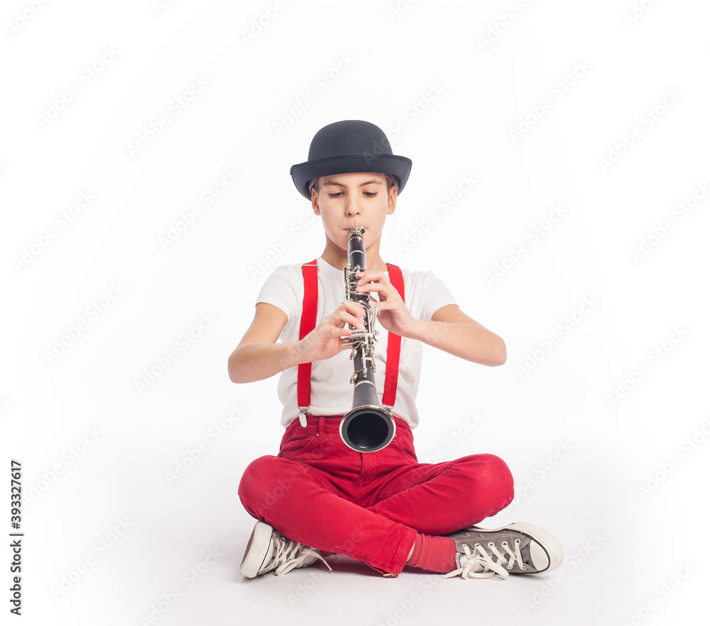little girl playing clarinet on a white background Stock Photo | Adobe ...