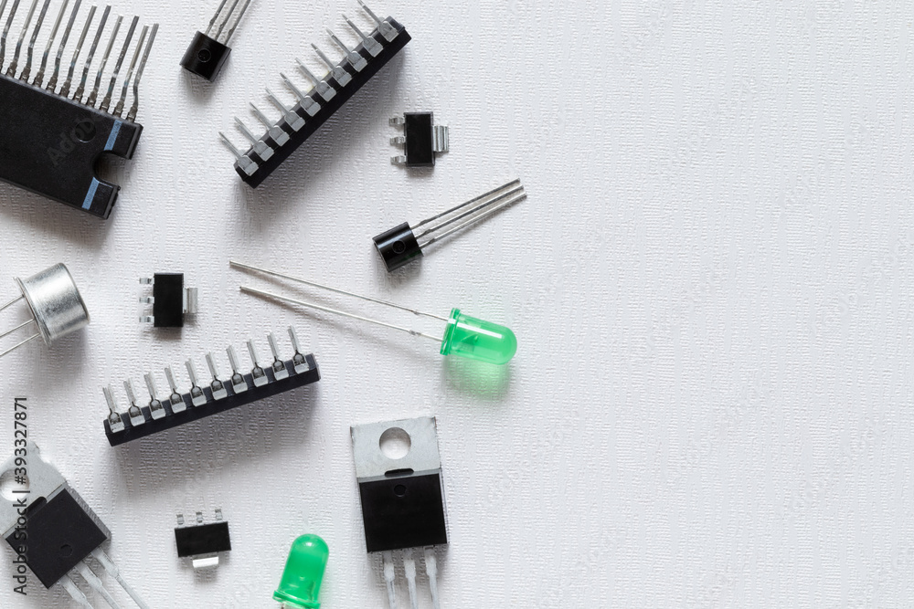 Electronic components over white background with copy space. There are ...