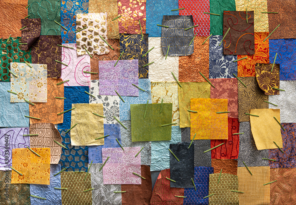 Patchwork quilt. Part of patchwork quilt as background. Flower print on ...