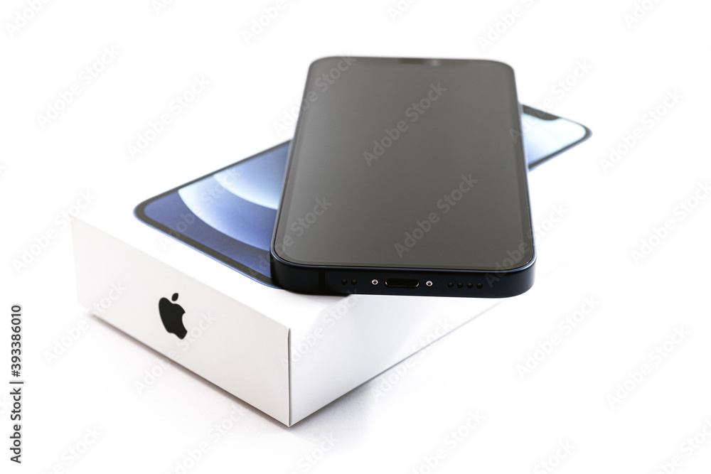 New Apple iPhone 12 mini blue on the box isolated on white background ...