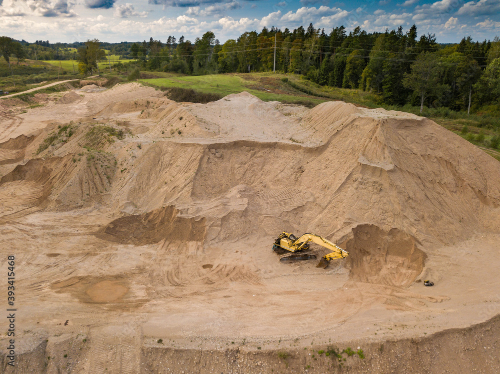 Top drone view. Excavators work on a sand pit. Extraction of sand ...