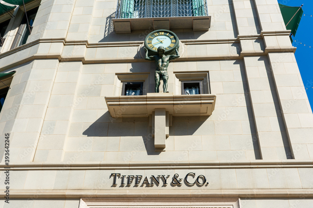 Tiffany & Co sign and historic clock on store facade located at Rodeo ...